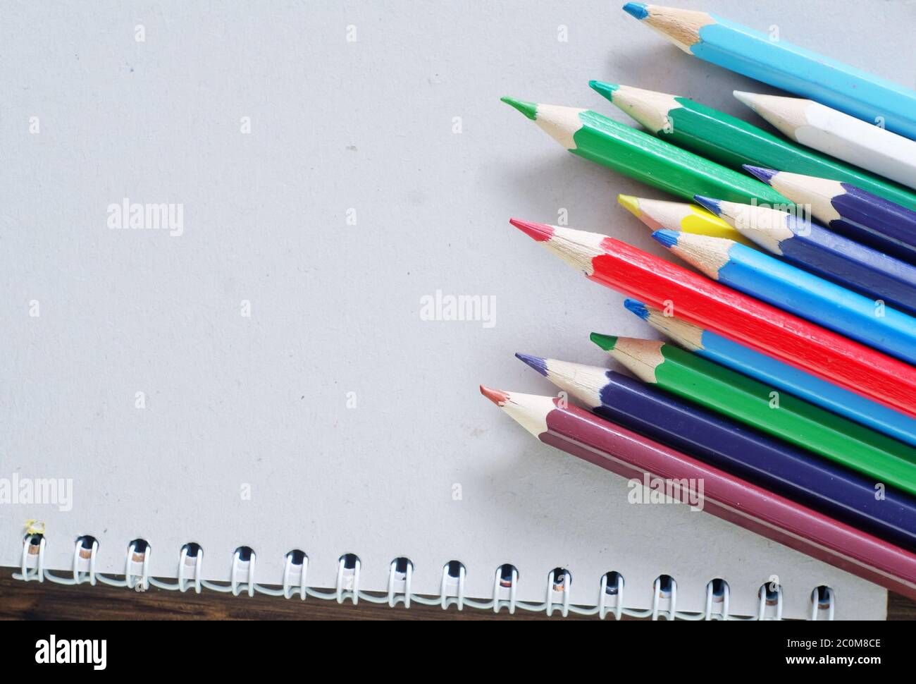 color pencils and note Stock Photo - Alamy