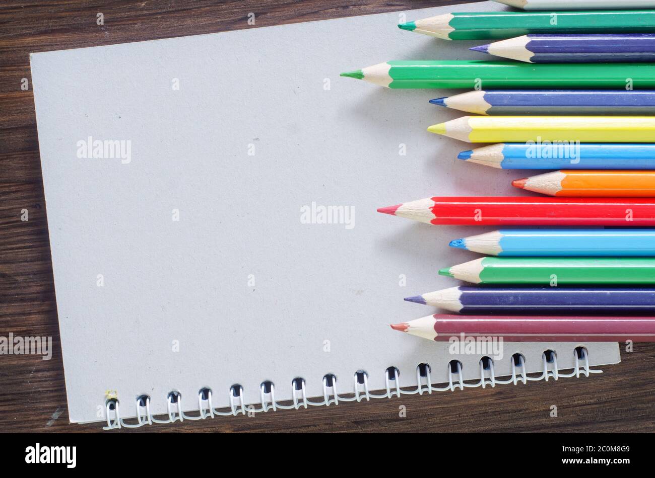 color pencils and note Stock Photo - Alamy
