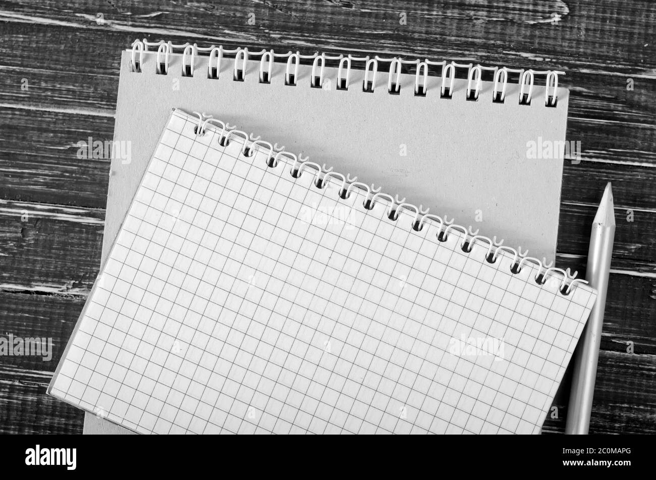 Spiral notebook pencil on Black and White Stock Photos & Images - Alamy