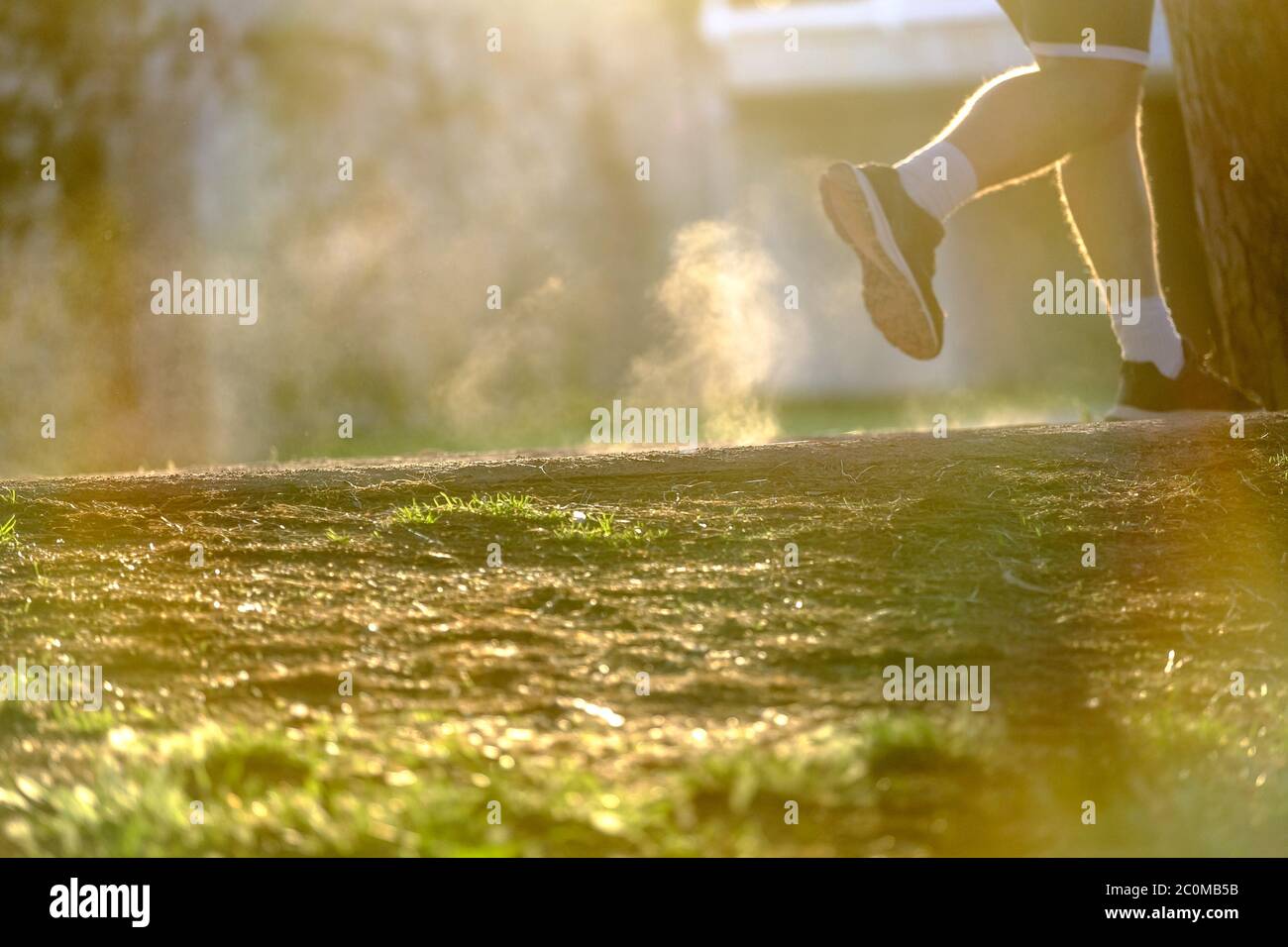 runner up dust while running, blurred backlight motion imagepracticing ...