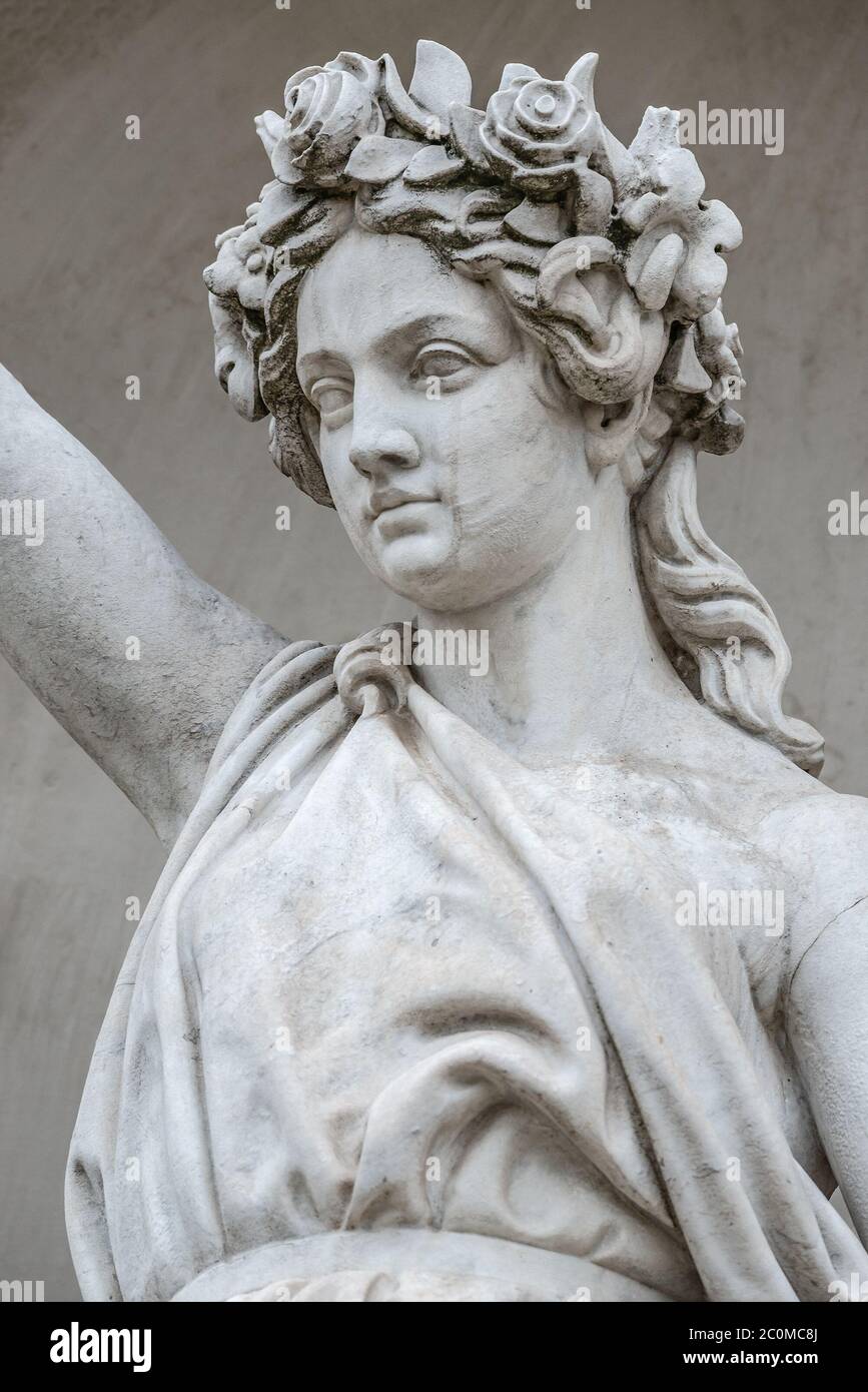 Statue of sensual busty and puffy renaissance era woman in circlet of ...