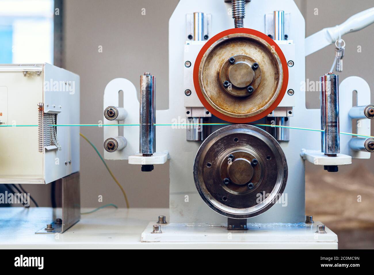 Inside a modern plant producing power electric cables and optical ...