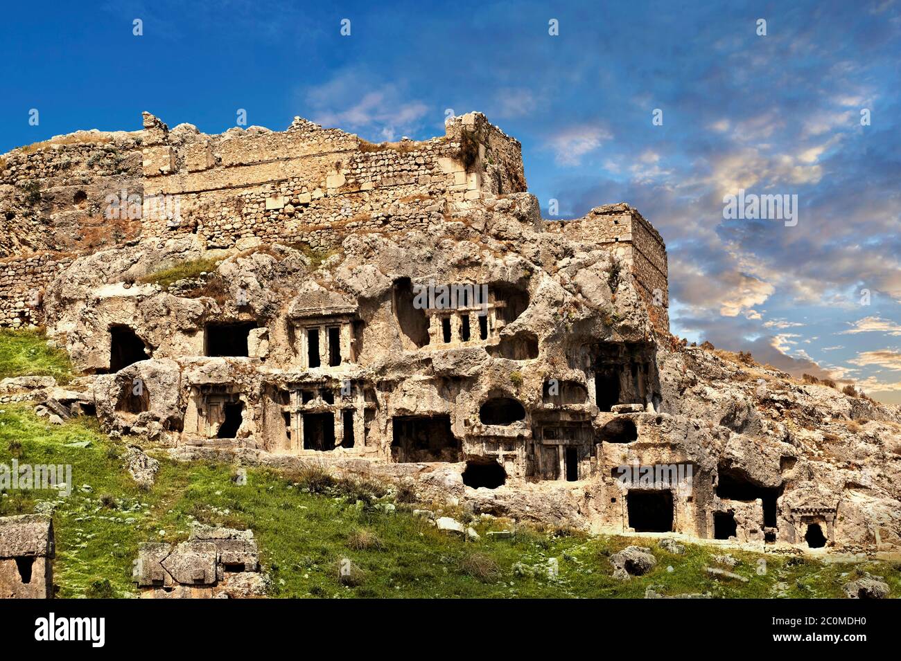 Tlos acropolis and Lycian house and temple-type rock-cut tombs. Tlos is ...