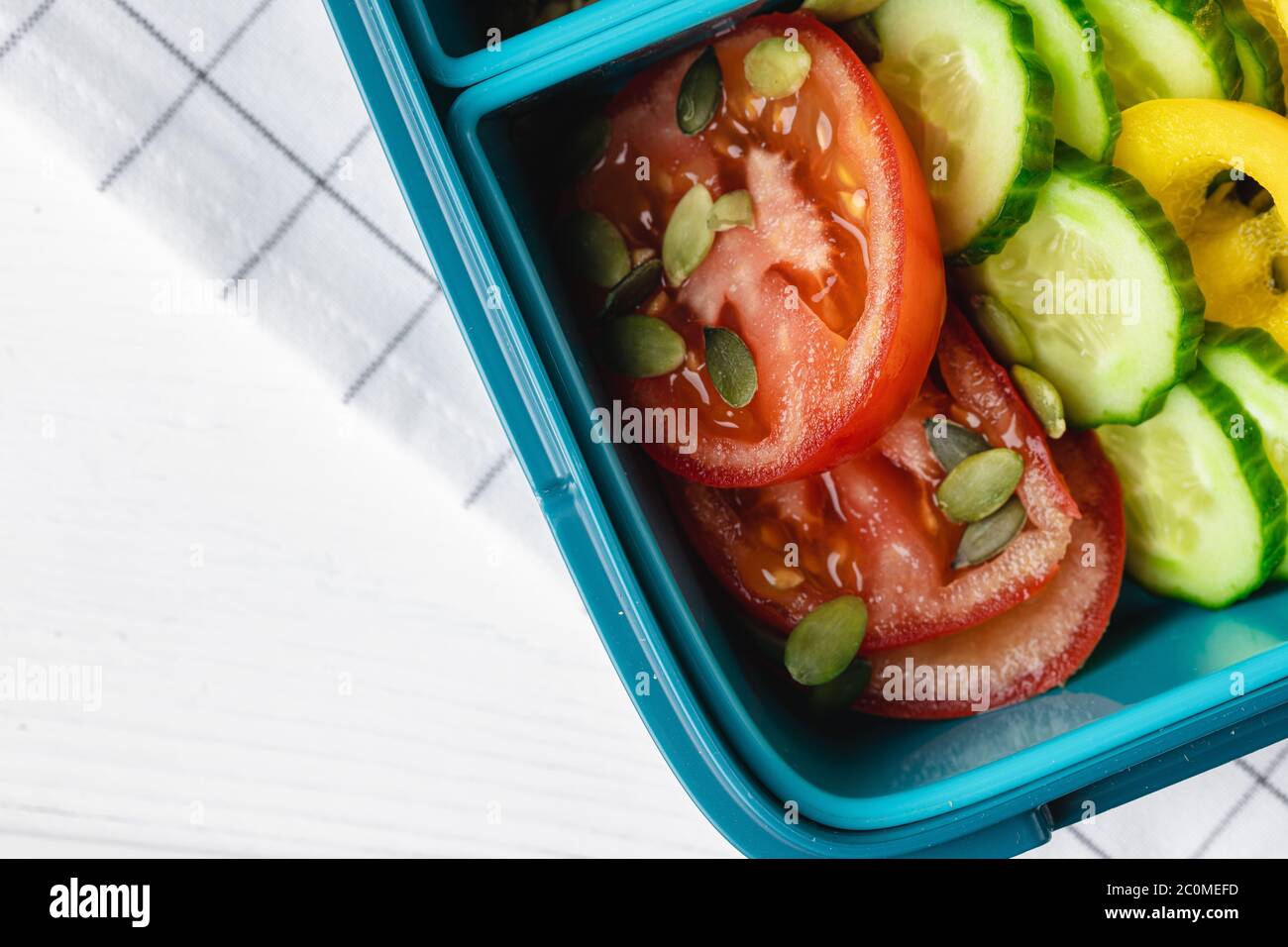 Close up photo of plastic lunch box with cooked food Stock Photo - Alamy