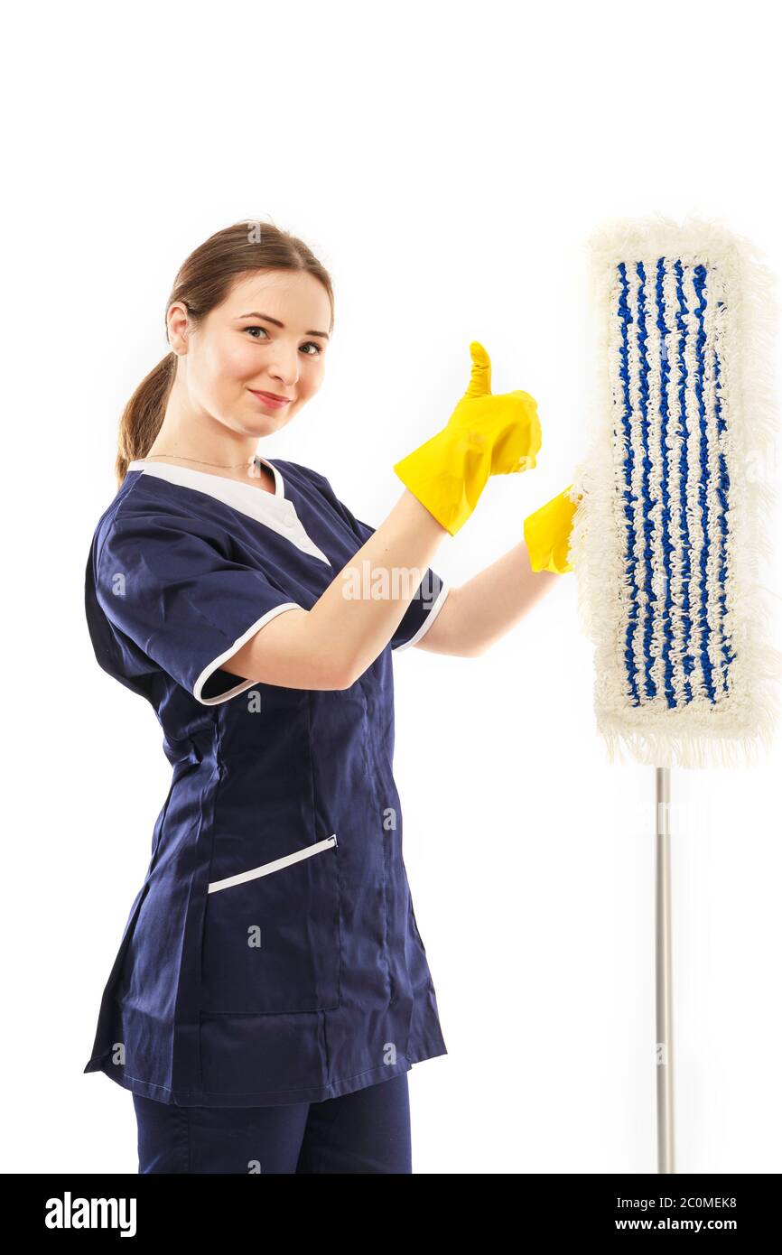 Woman finished cleaning showing a happy thumbs up after a successful ...