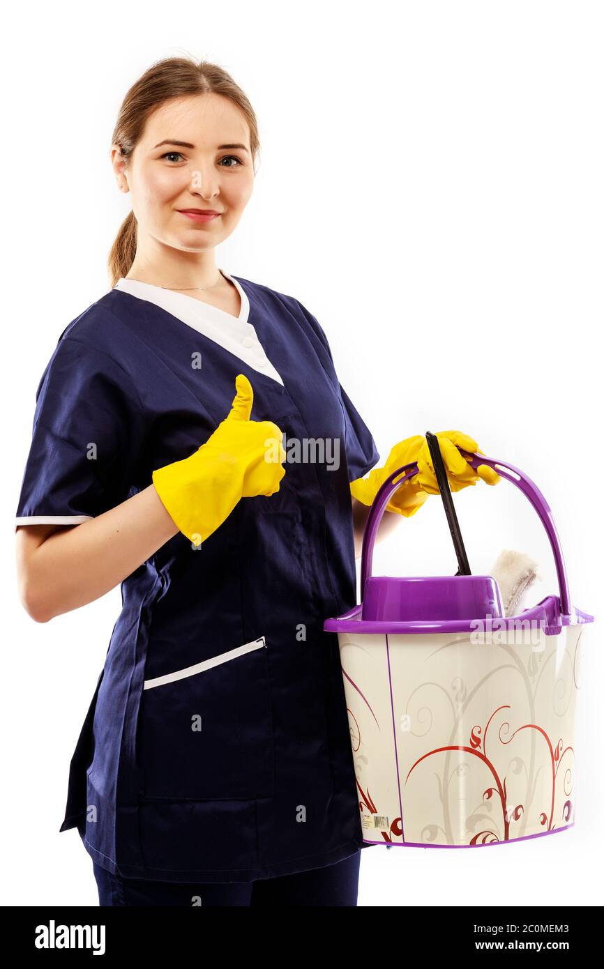 Woman finished cleaning showing a happy thumbs up after a successful ...