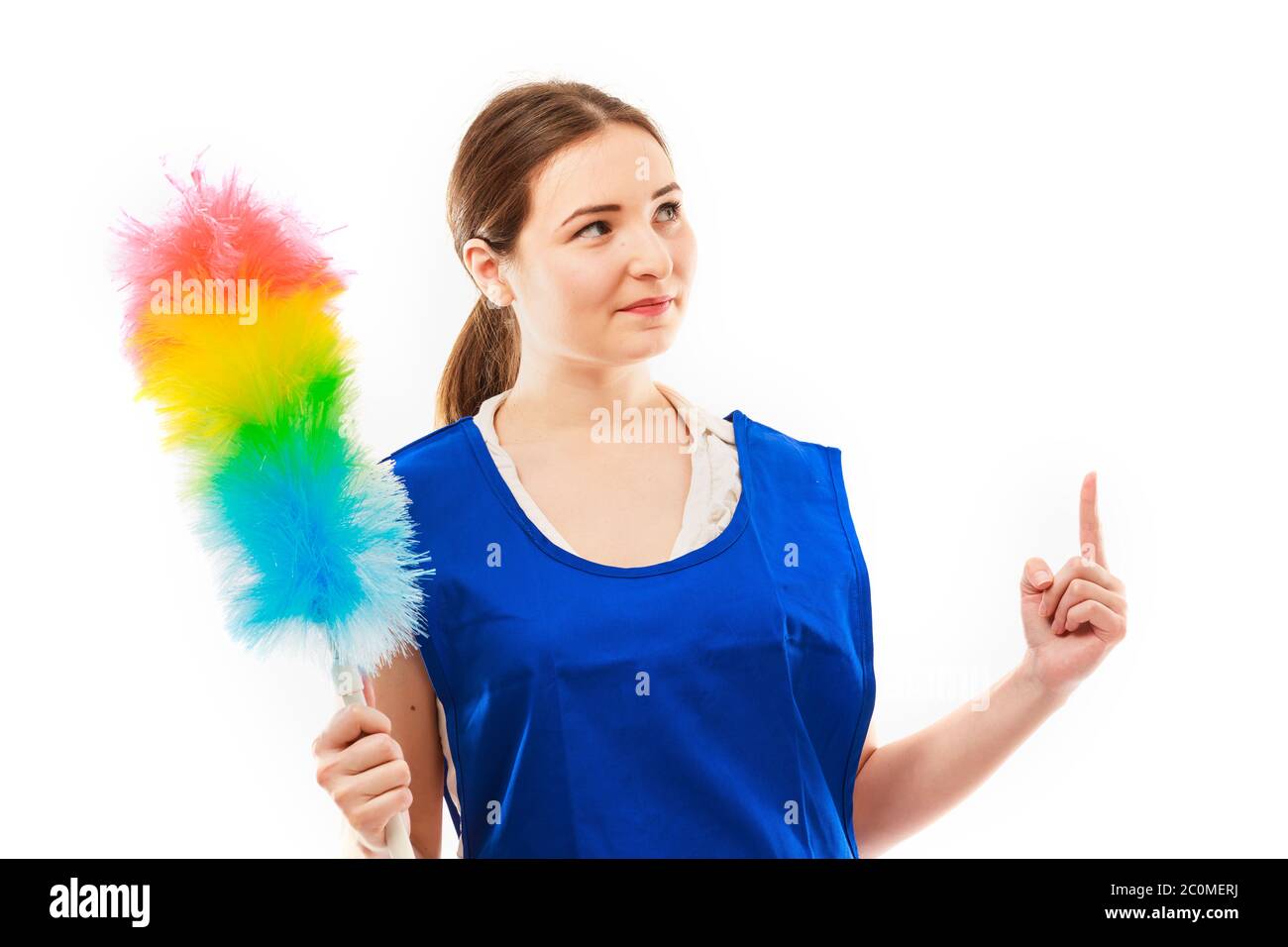 Cleaning woman pointing and showing your product or text isolated on ...