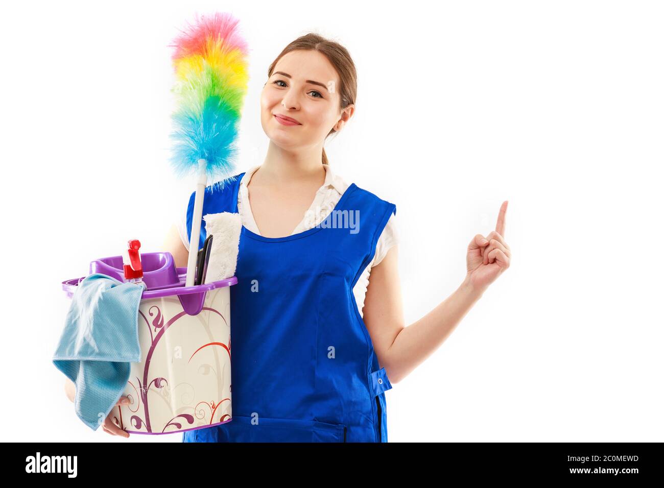 Cleaning woman pointing and showing your product or text isolated on ...