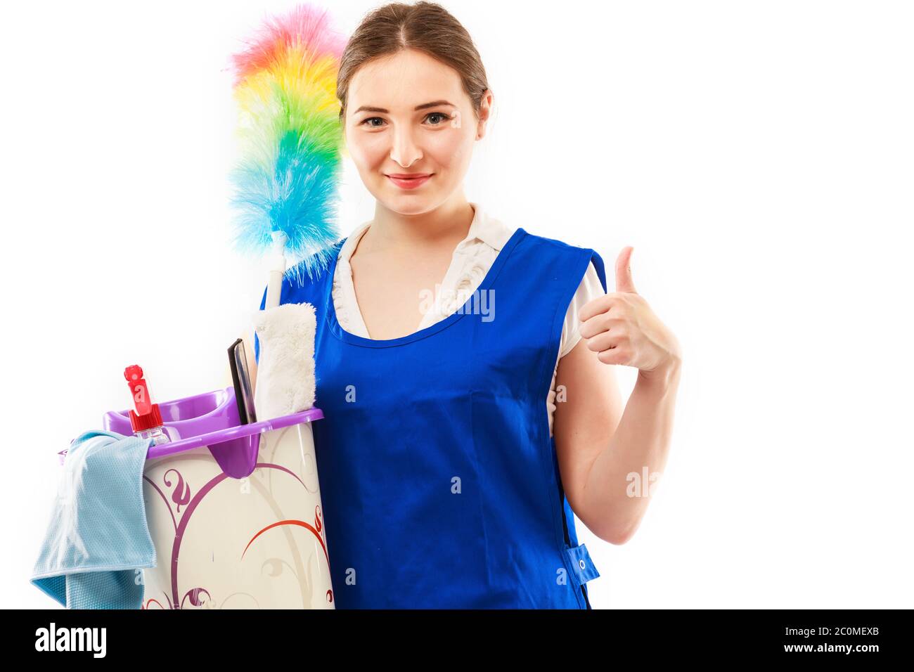 Woman finished cleaning showing a happy thumbs up after a successful ...
