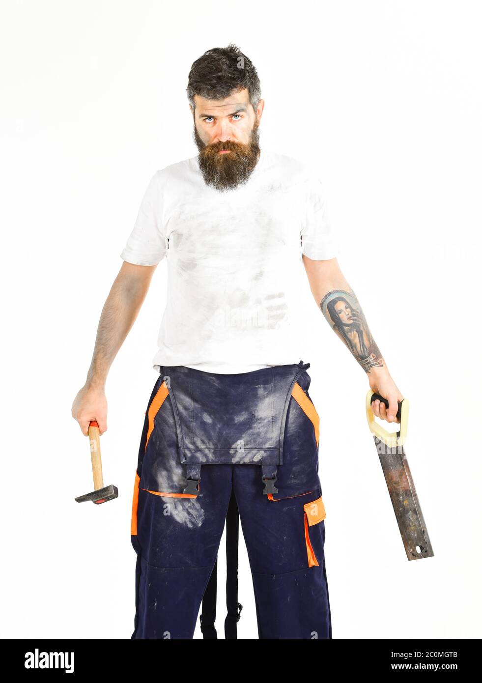 Man with beard in dirty dusty boilersuit. Builder, plasterer, repairman ...
