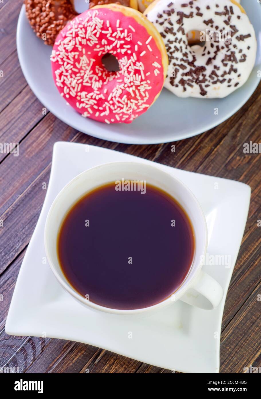 coffee and donuts Stock Photo - Alamy