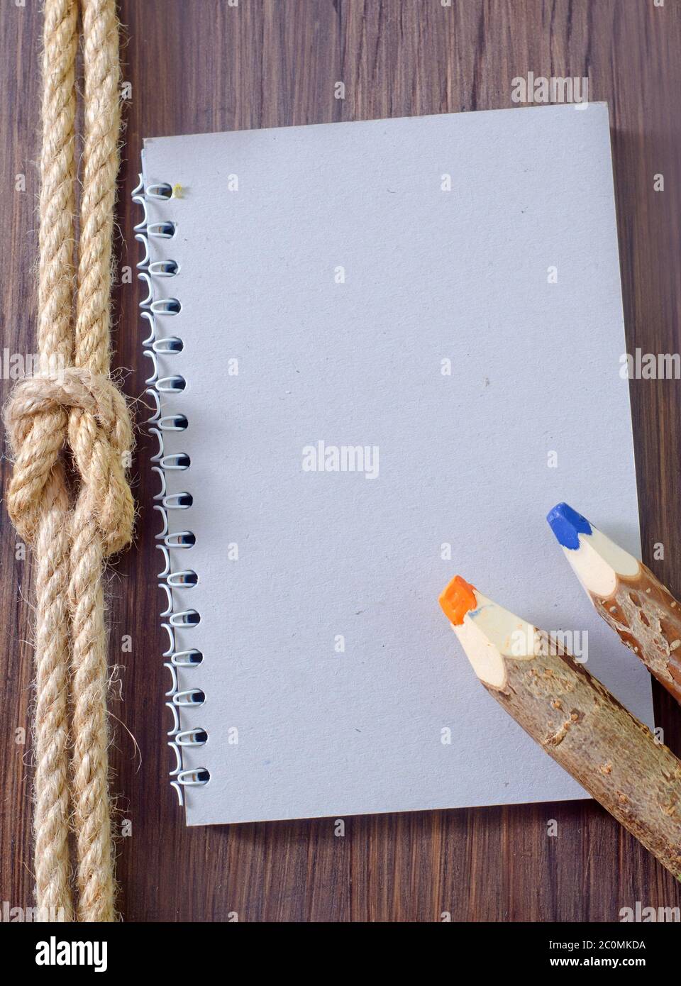 note and pencils Stock Photo - Alamy