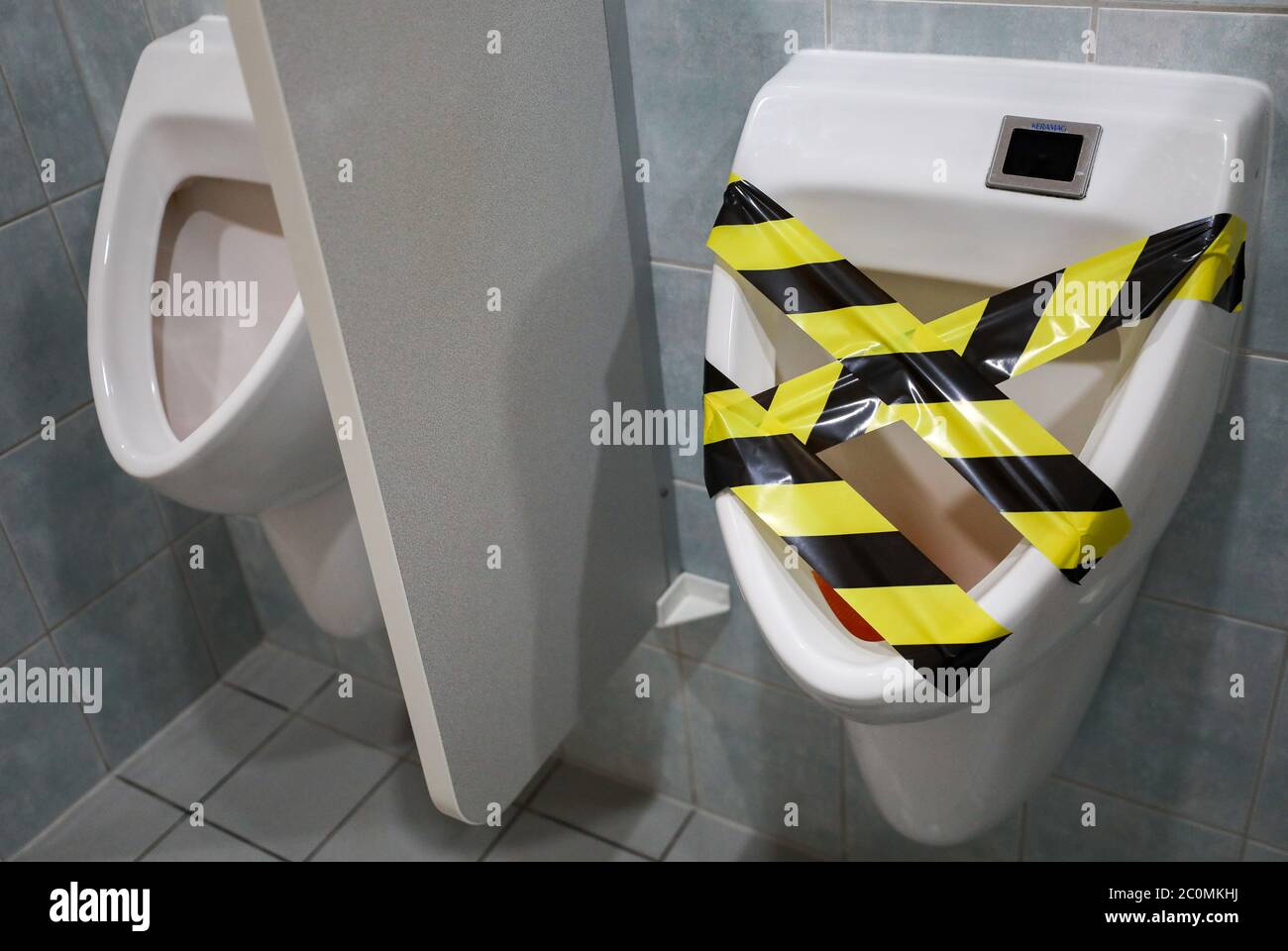 12 June 2020, Saxony, Chemnitz: One of two urinals is closed with ...