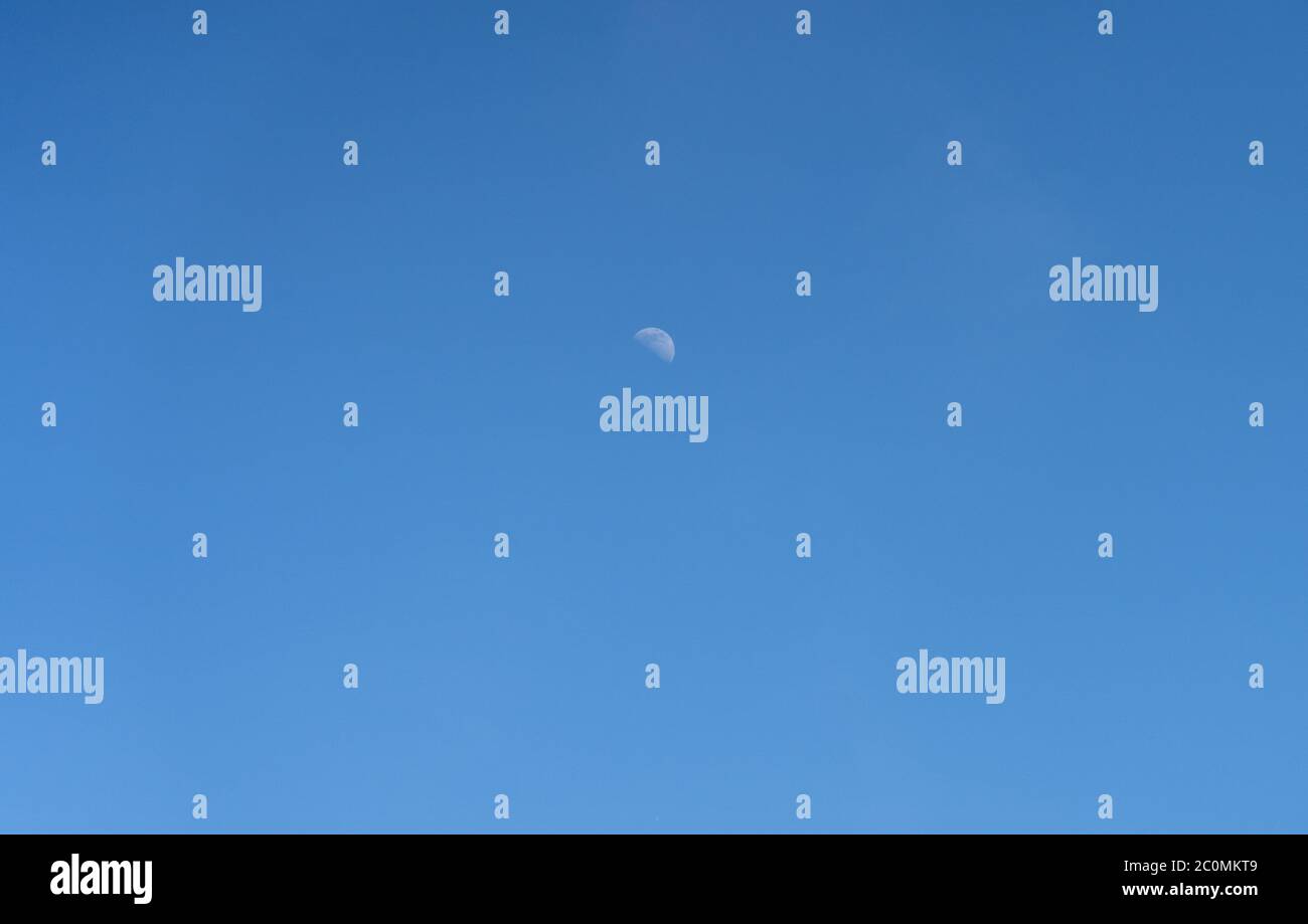 Half moon clear blue sky astrology hi-res stock photography and images ...
