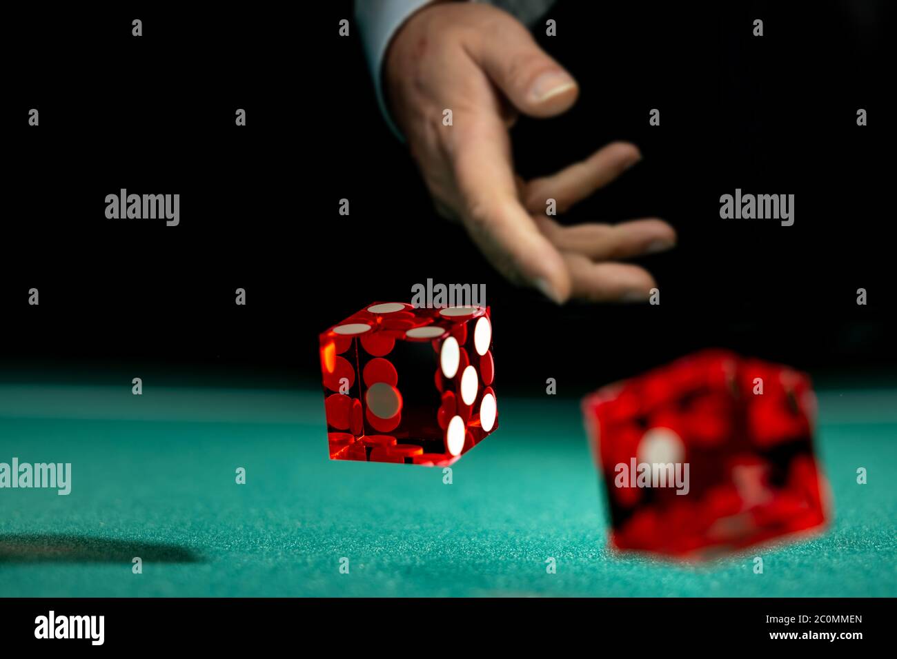 Man gambling at the craps table at the casino - Selective focus Stock ...