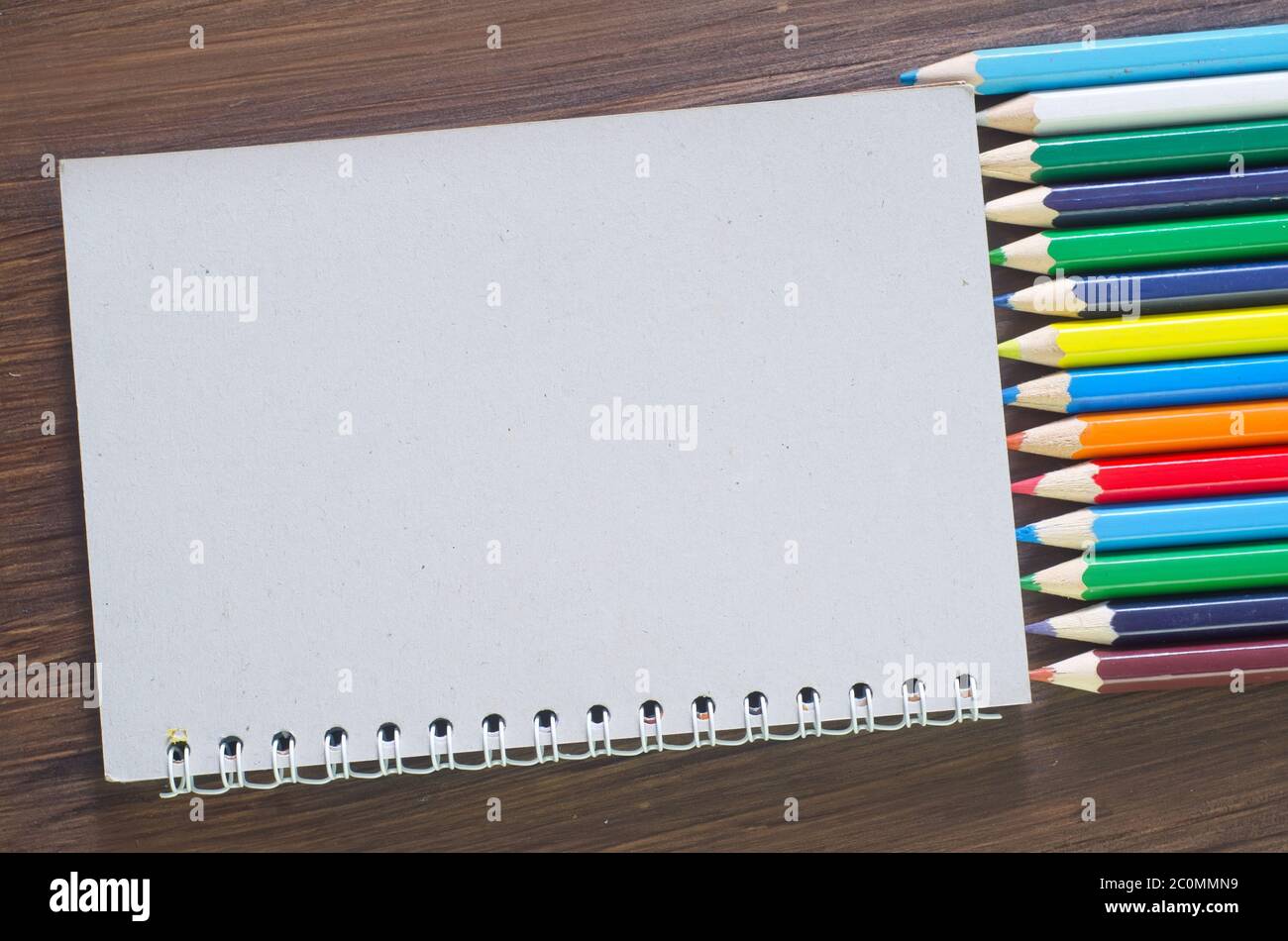 color pencils and note Stock Photo - Alamy