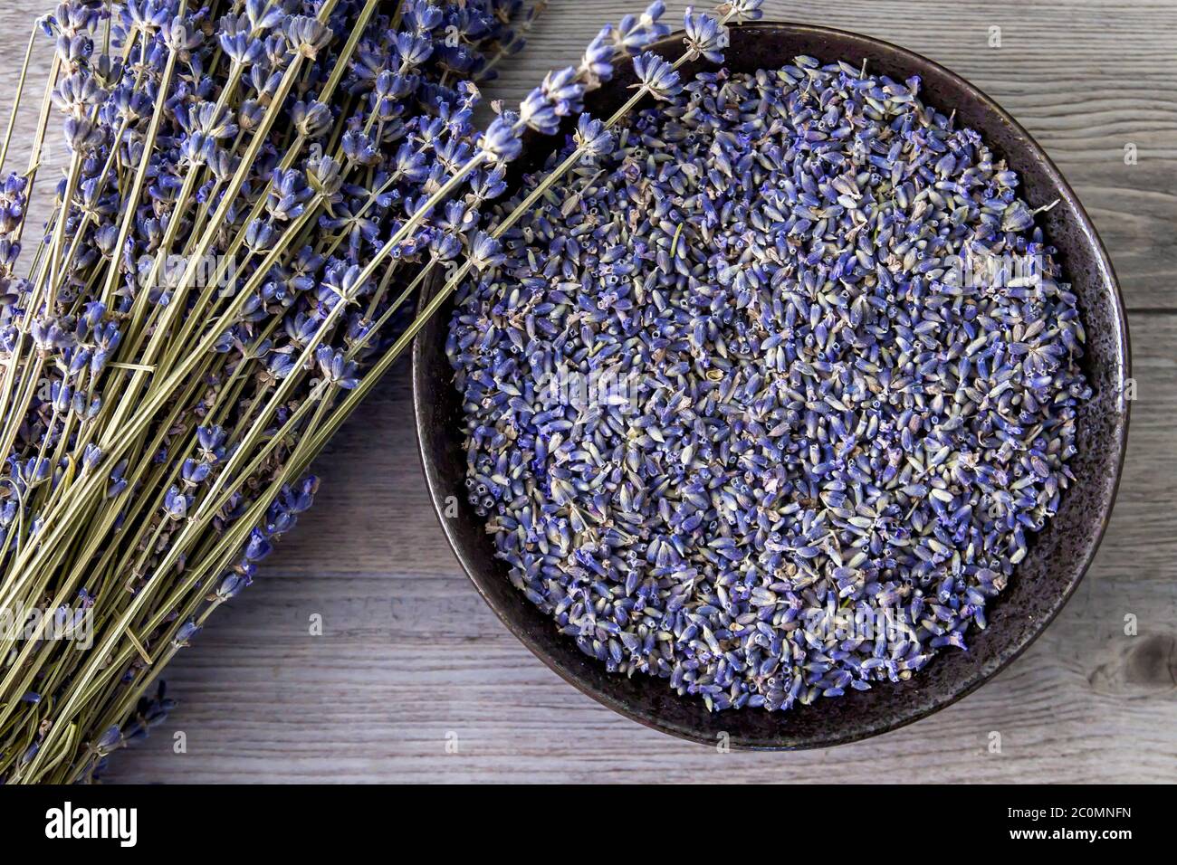 Dried lavender flowers bouquet and bowl Stock Photo - Alamy