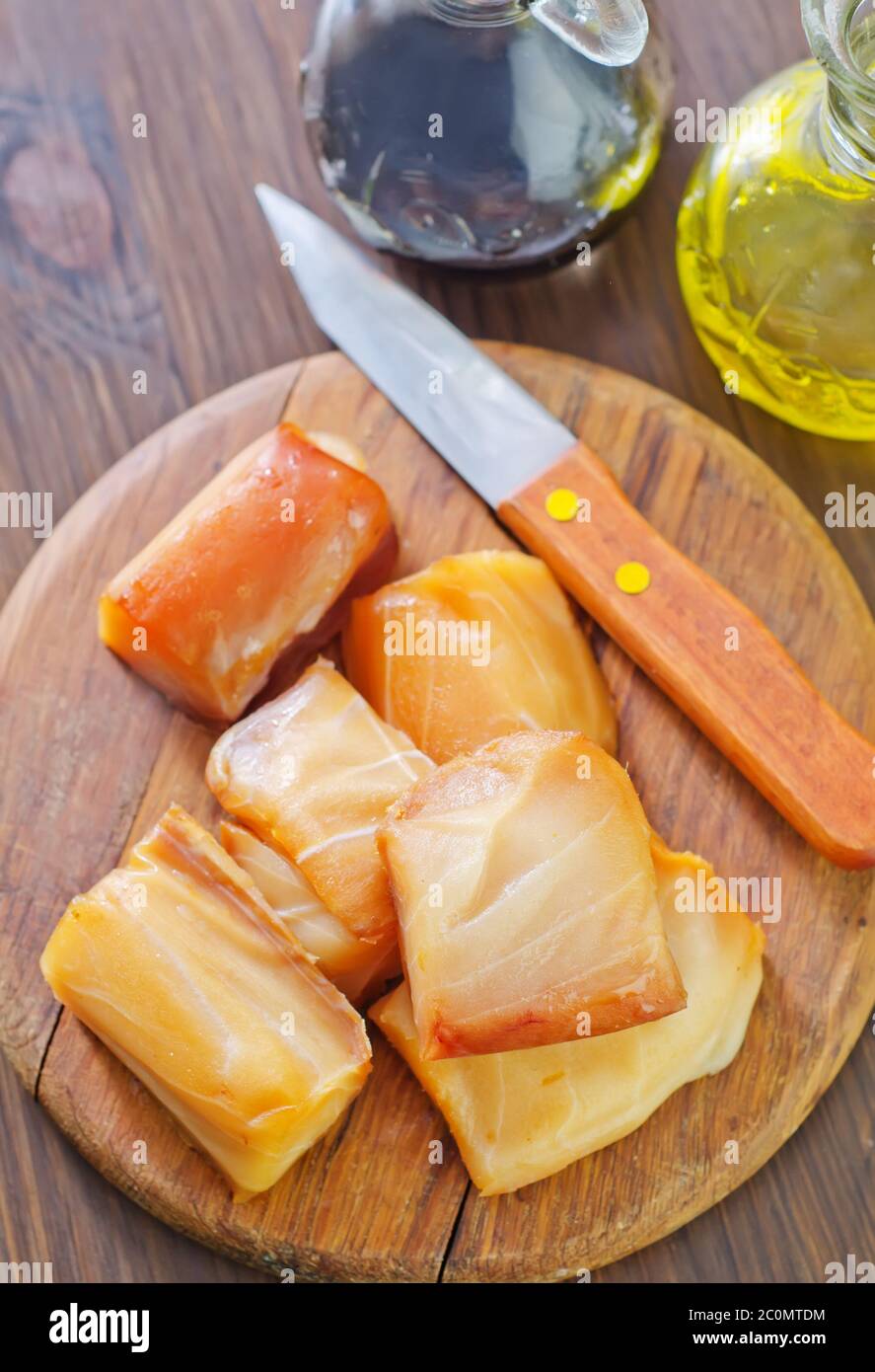smoked fish on board Stock Photo - Alamy