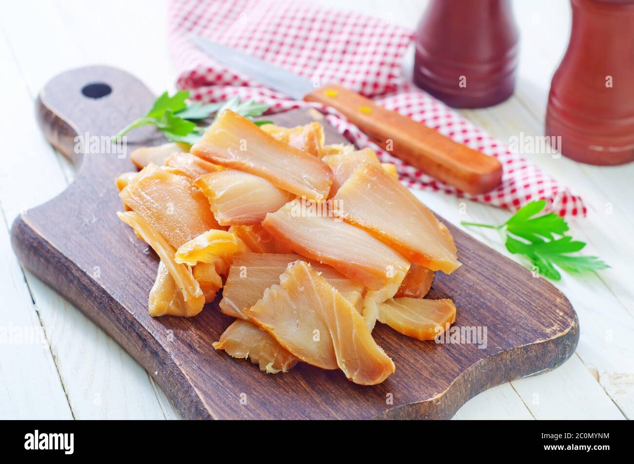 smoked fish on board Stock Photo - Alamy