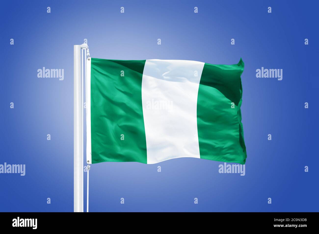 Flag of Nigeria flying against a blue sky Stock Photo - Alamy