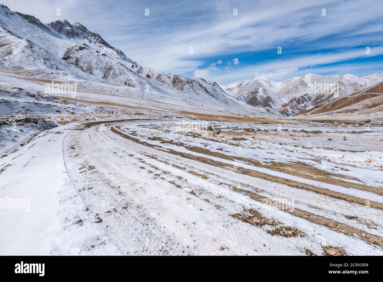 the gravel road on the snow mountain Stock Photo - Alamy