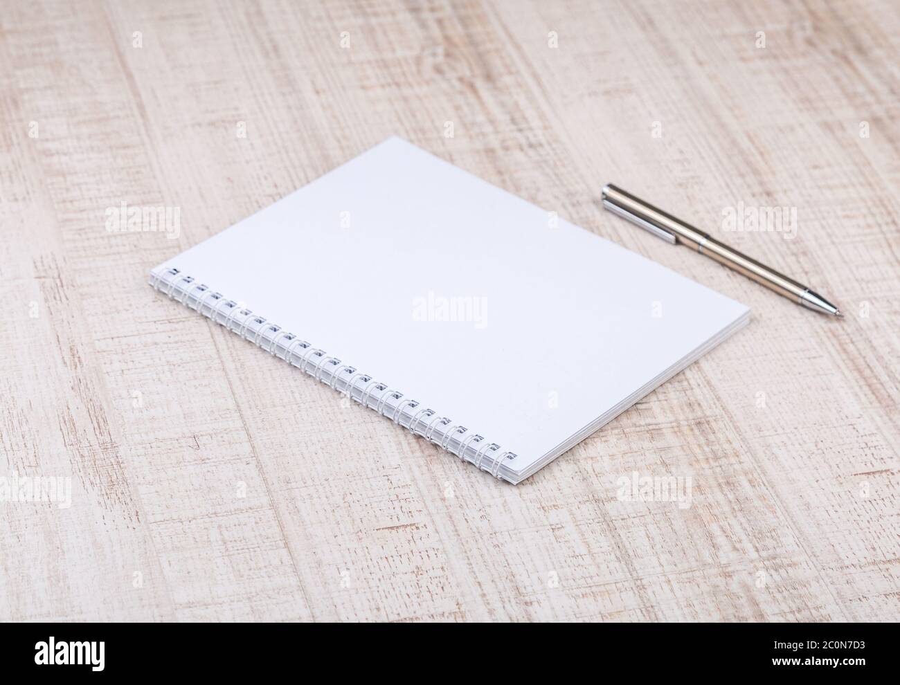 blank white notebook on the desk Stock Photo - Alamy