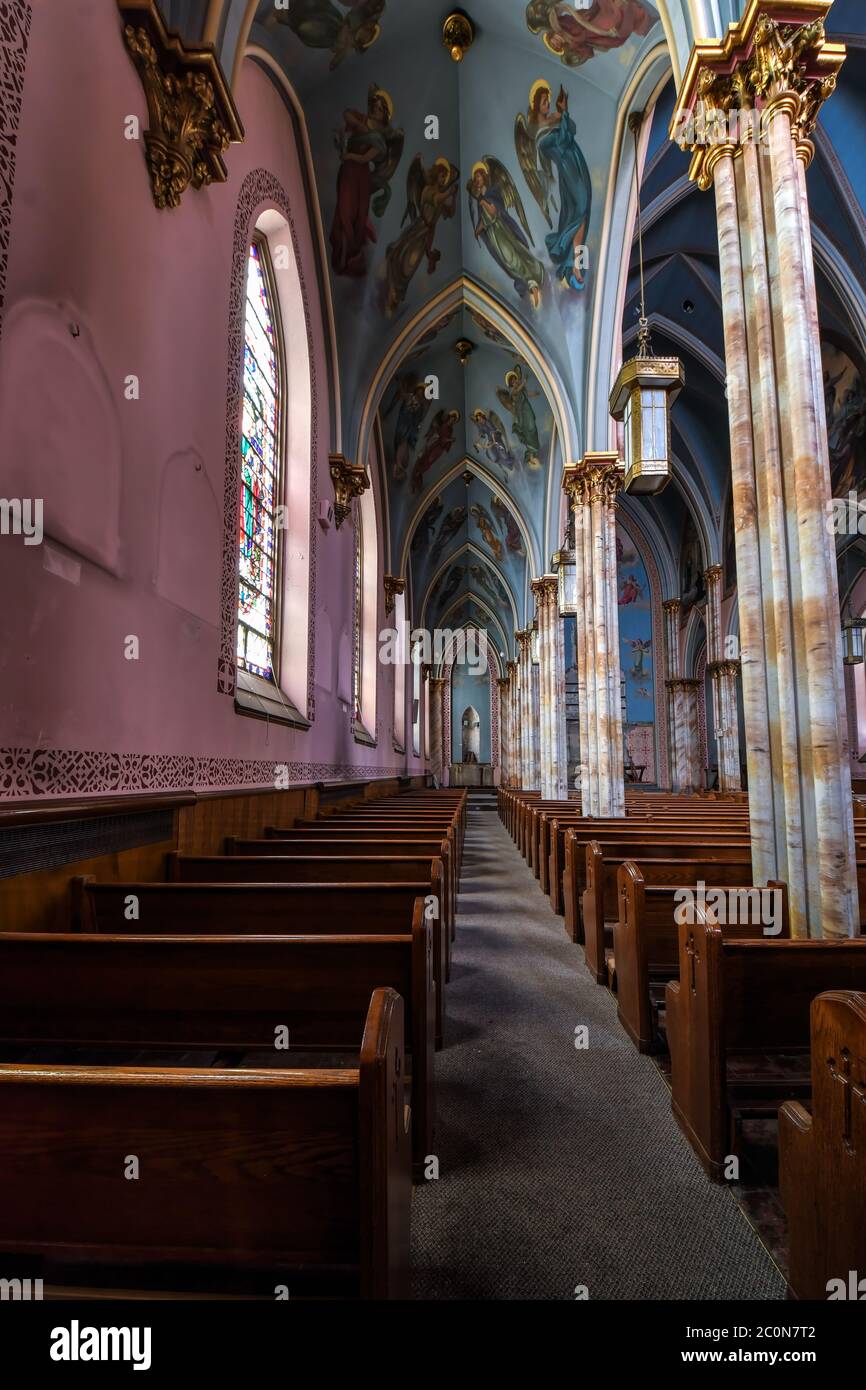 Beautiful pink and blue church interior with murals and altar Stock ...