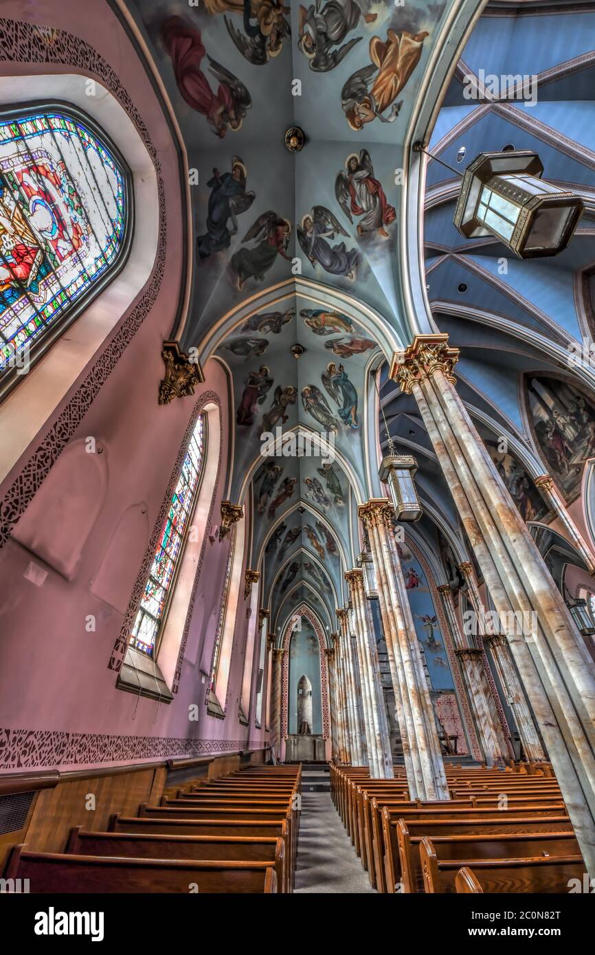 Beautiful pink and blue church interior with murals and altar Stock ...