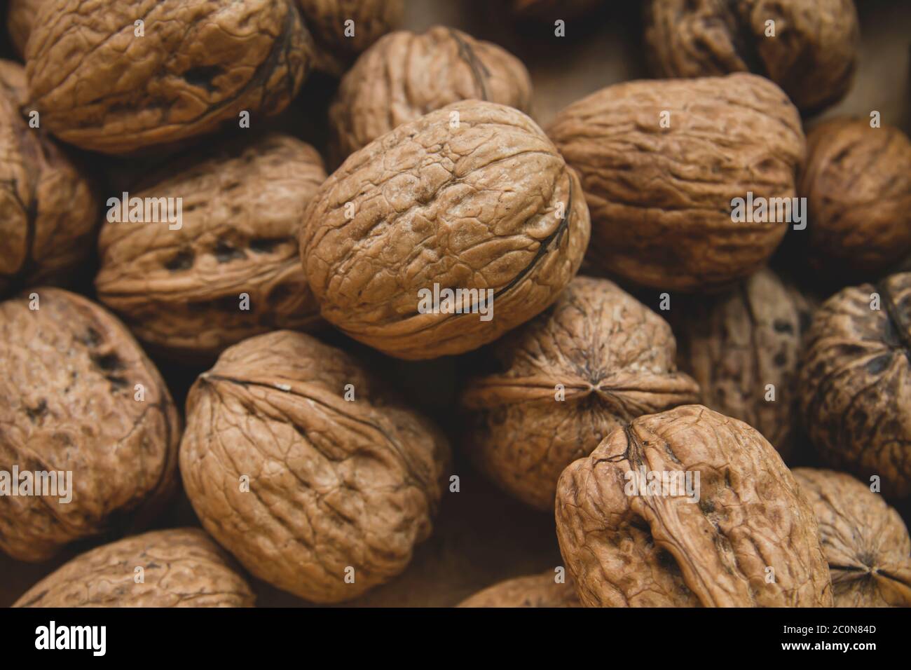 A pile of shelled walnuts Stock Photo - Alamy