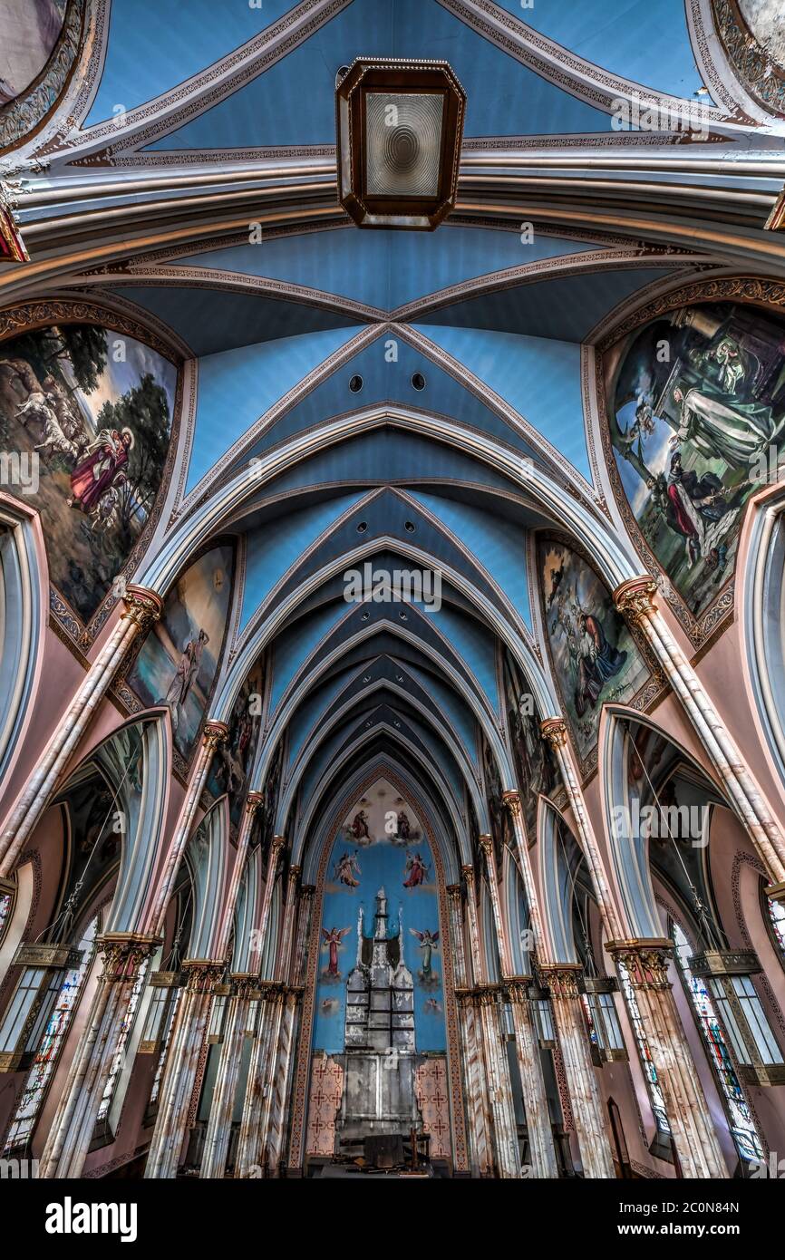 Beautiful pink and blue church interior with murals and altar Stock ...