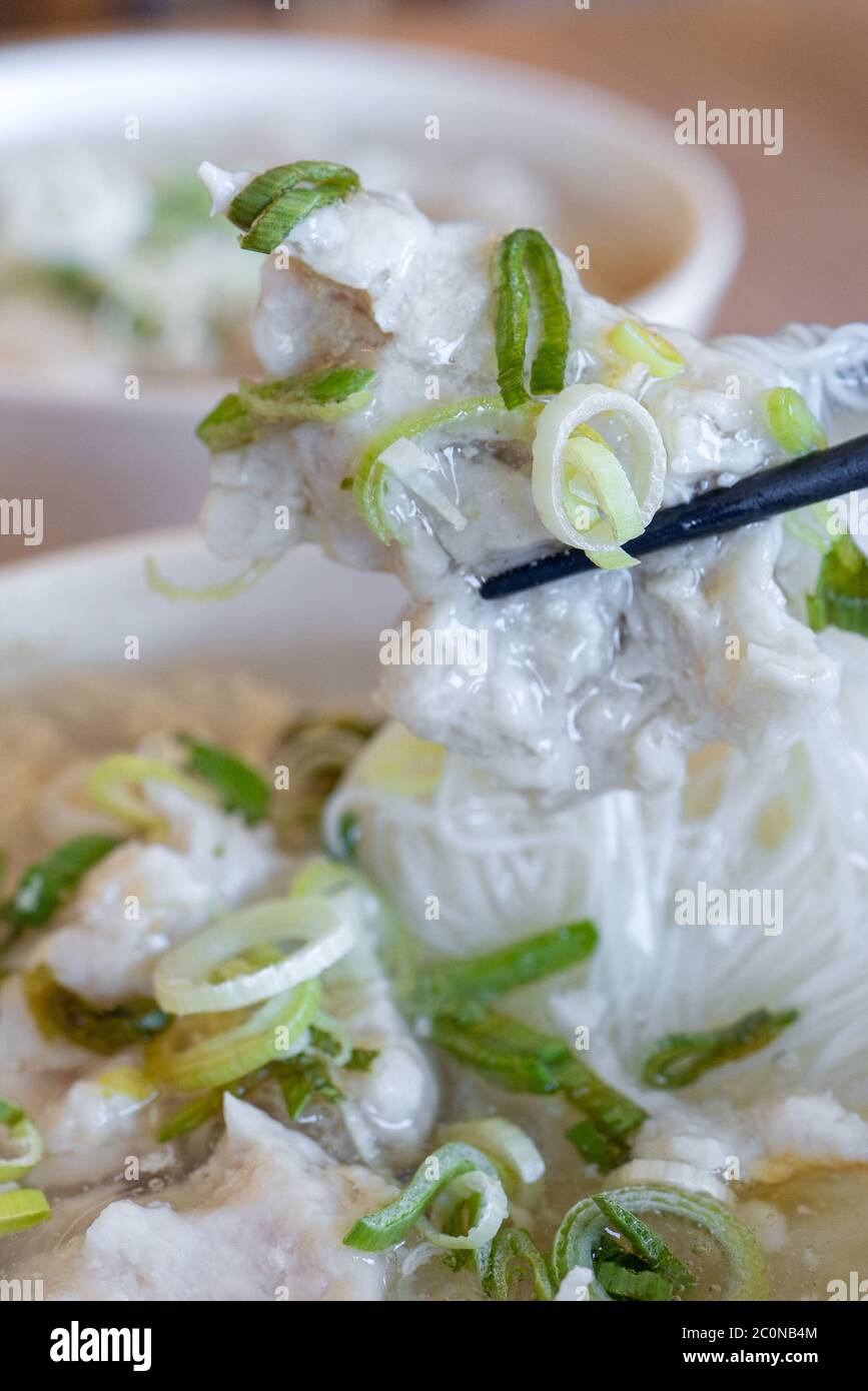 Delicious fish ball rice noodles in thick soup, common food in Tainan ...