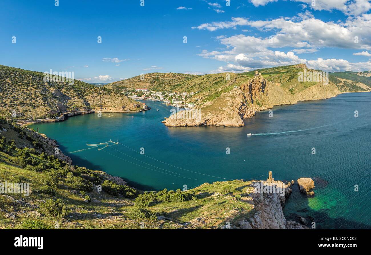 Scenic view of Balaclava bay with yachts, ruines of Genoese fortress ...