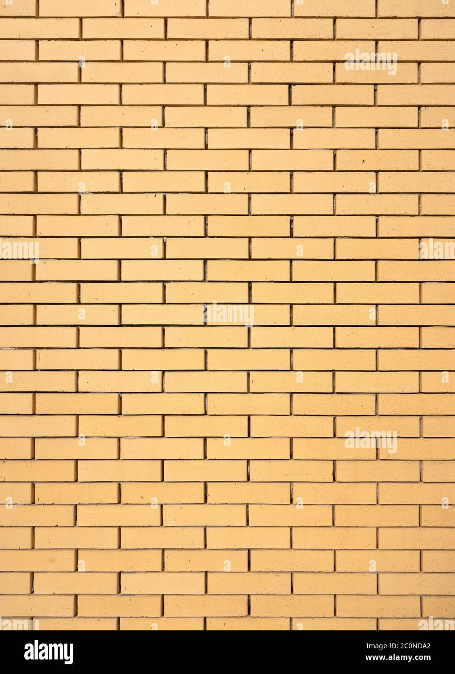 yellow bricks in masonry wall Stock Photo - Alamy
