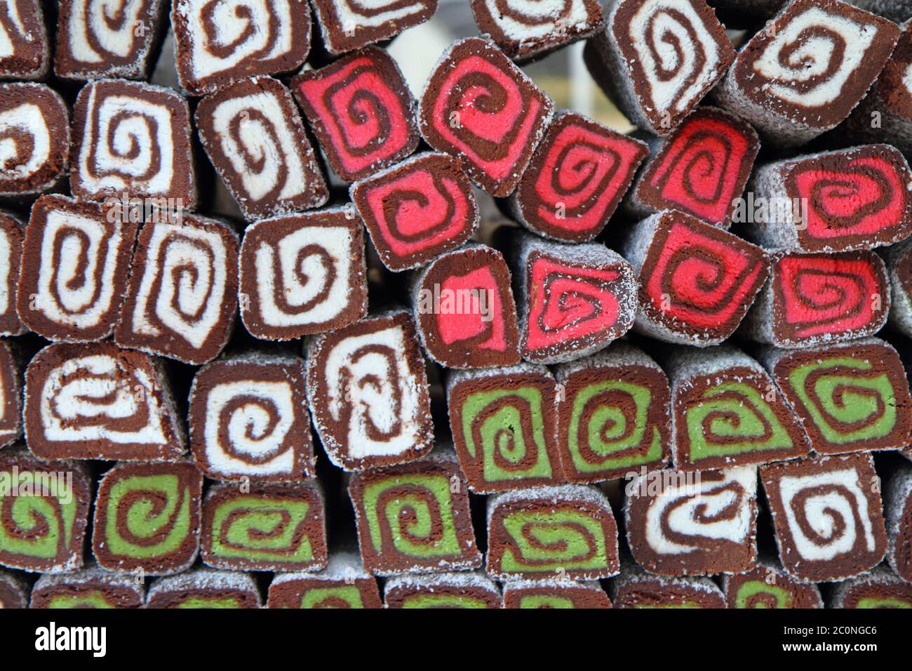 coconut dessert rolls as nice sweet backgrounds Stock Photo - Alamy