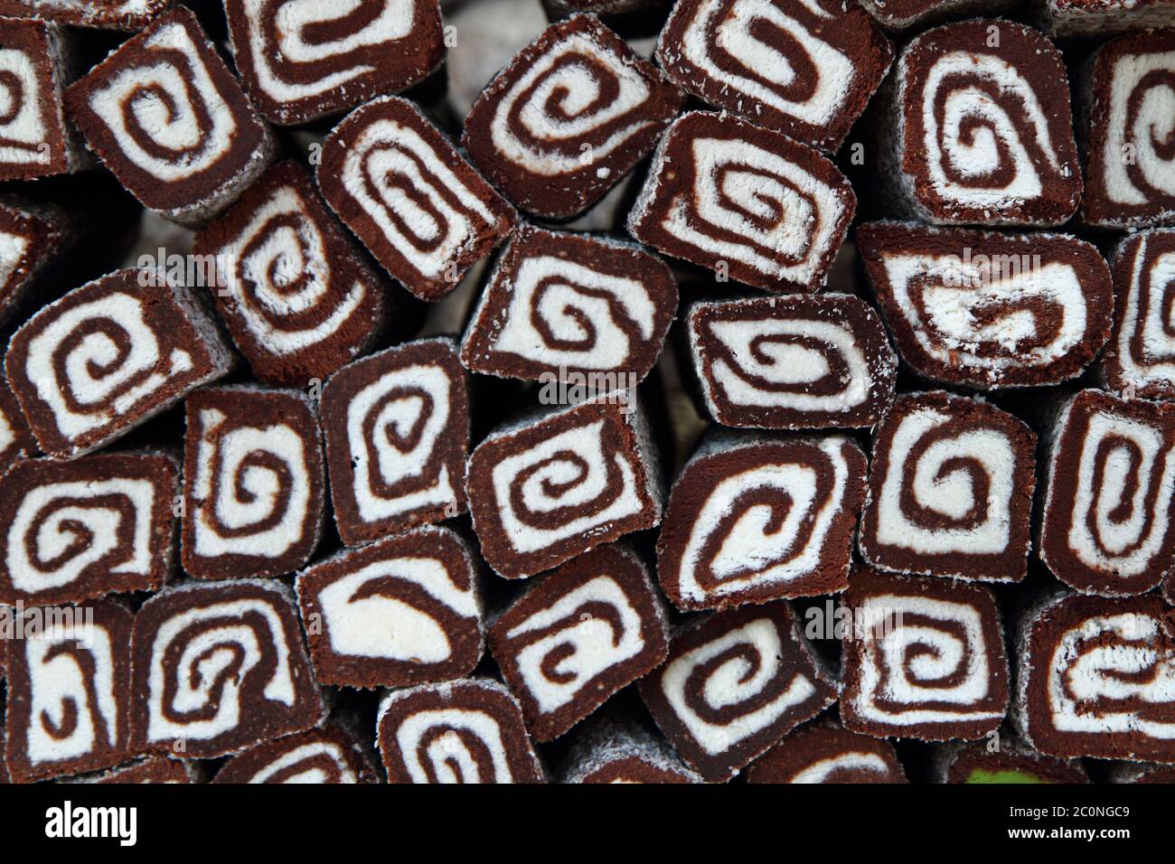 coconut dessert rolls as nice sweet backgrounds Stock Photo - Alamy