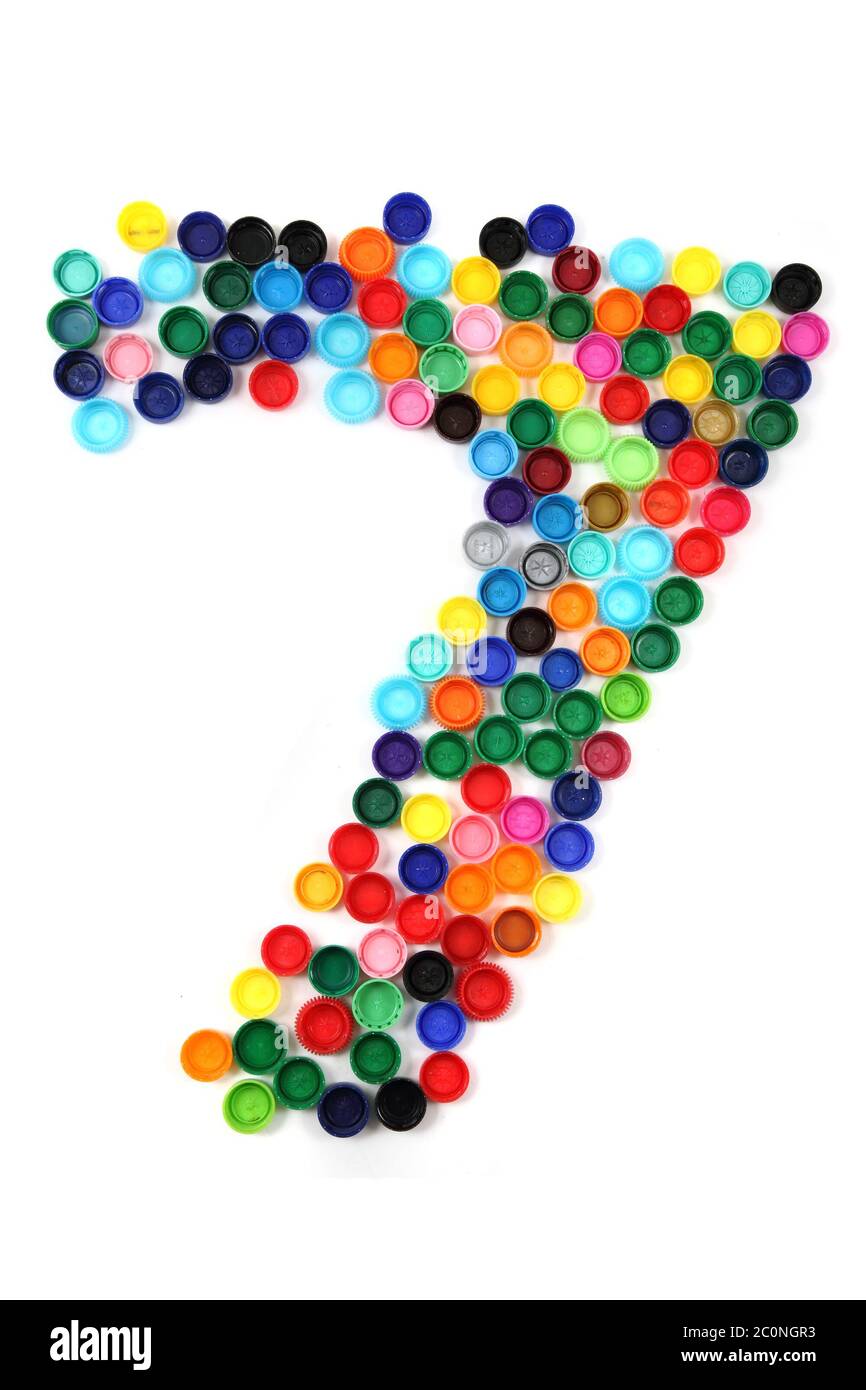 7 - number from the plastic caps isolated on the white background Stock ...