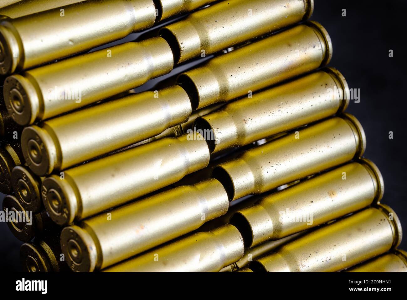 bullet shell cartridges on a black background Stock Photo - Alamy
