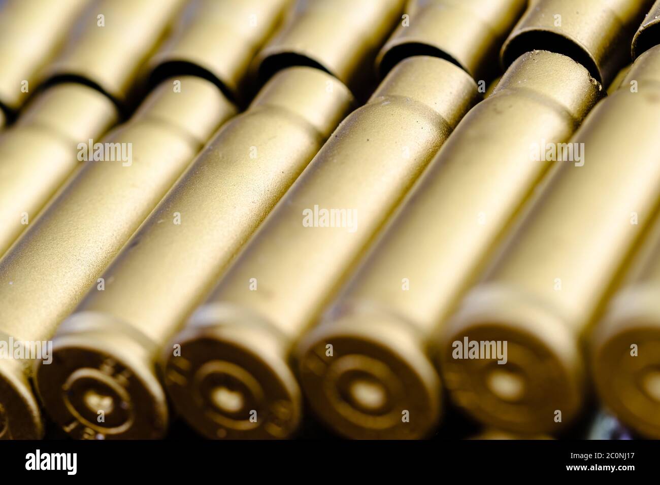 bullet shell cartridges on a black background Stock Photo - Alamy