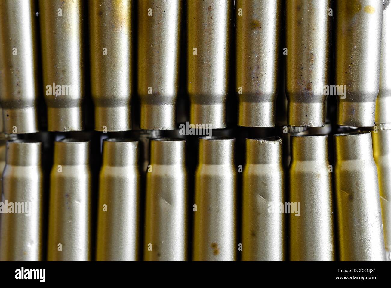 bullet shell cartridges on a black background Stock Photo - Alamy