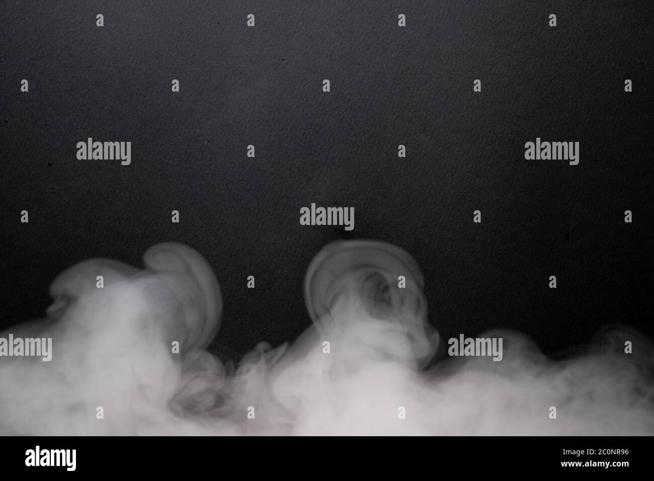 the abstract flow of smoke from a black background Stock Photo - Alamy