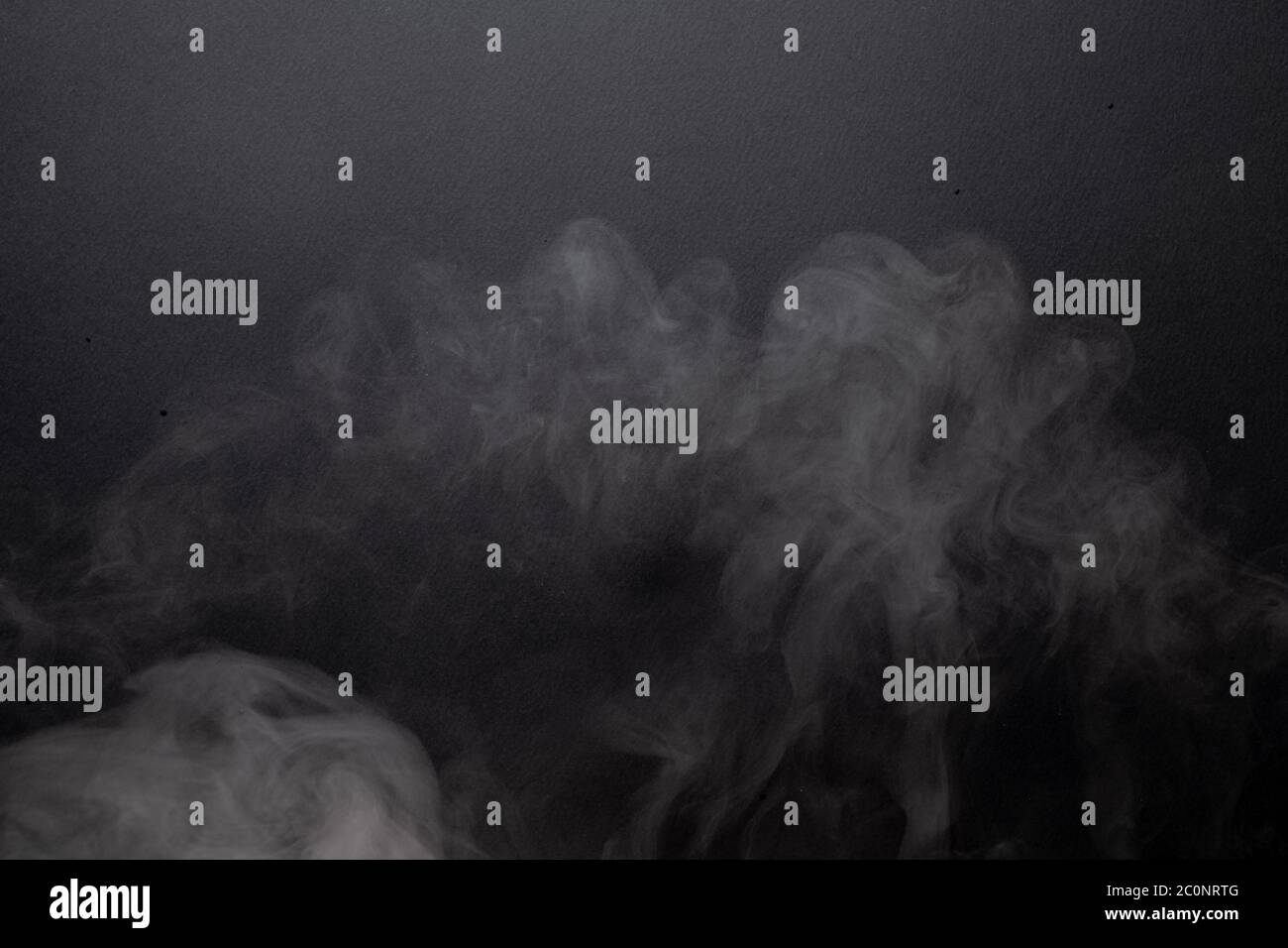 the abstract flow of smoke from a black background Stock Photo - Alamy