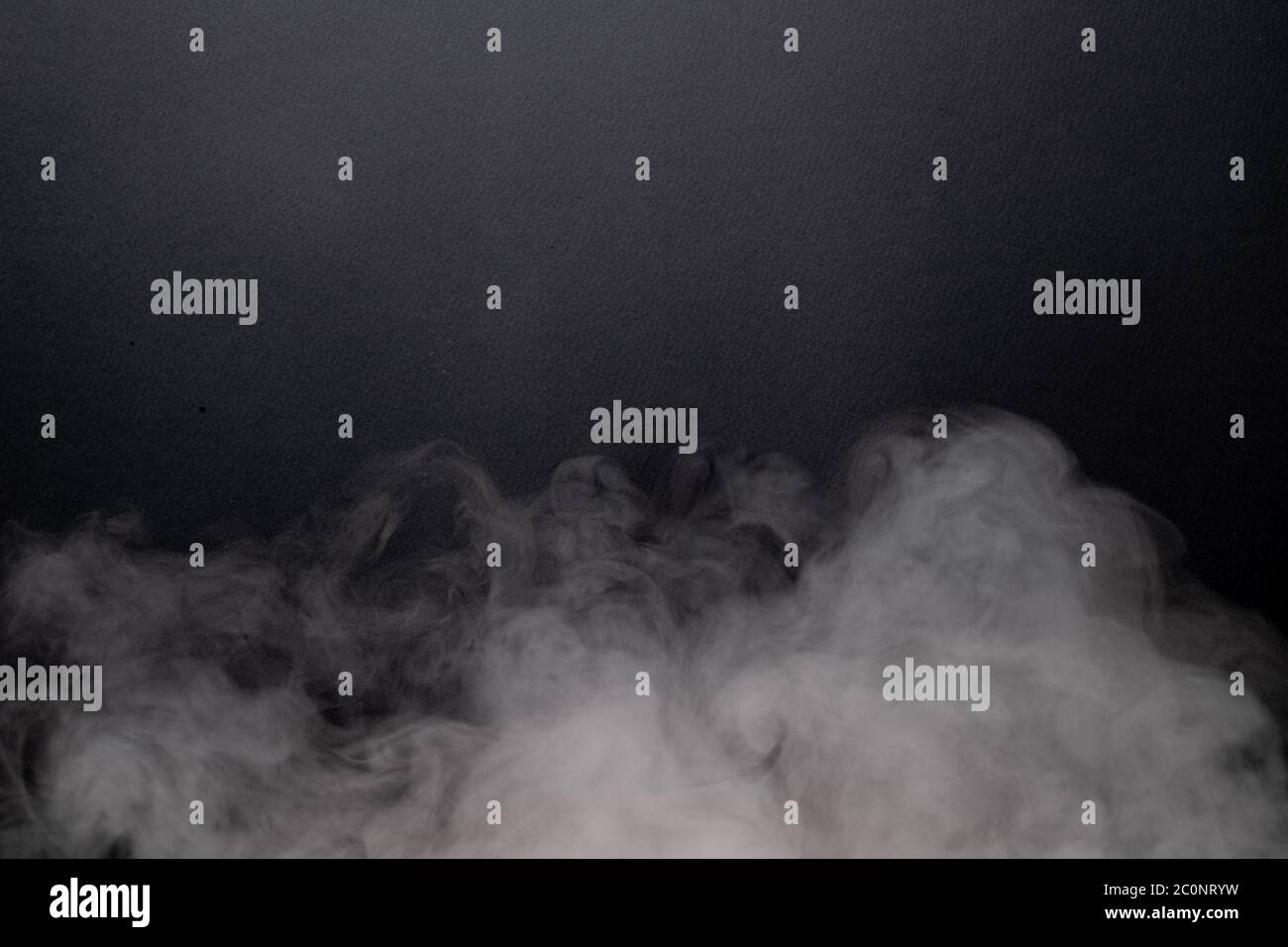 the abstract flow of smoke from a black background Stock Photo - Alamy