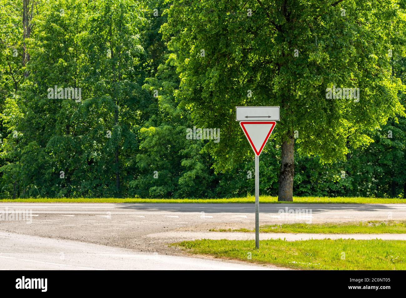 European road sign: give priority to traffic on the main road ahead ...