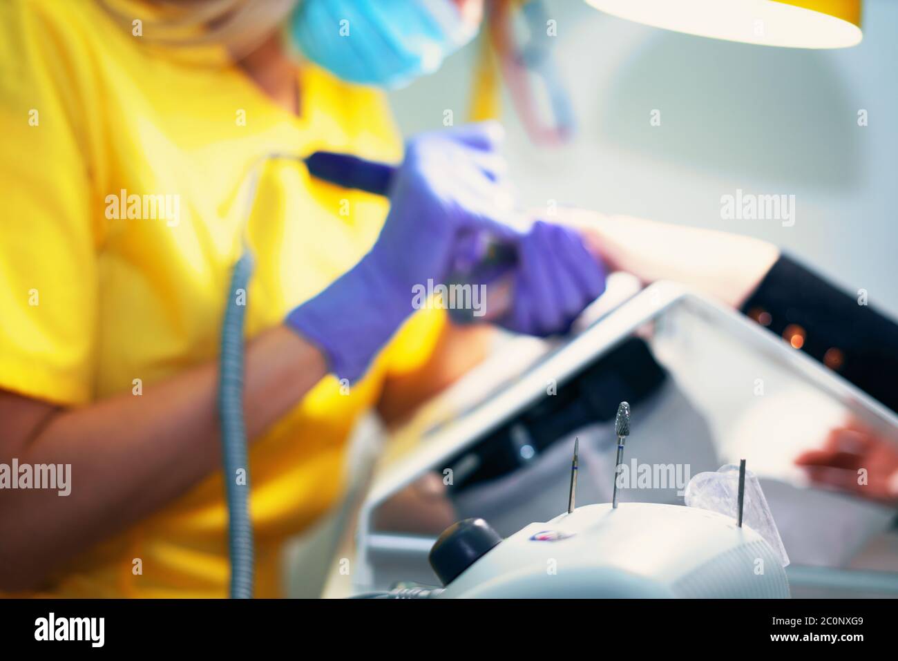 Nail care. Manicure in the salon. The master manicures the girl, beauty ...