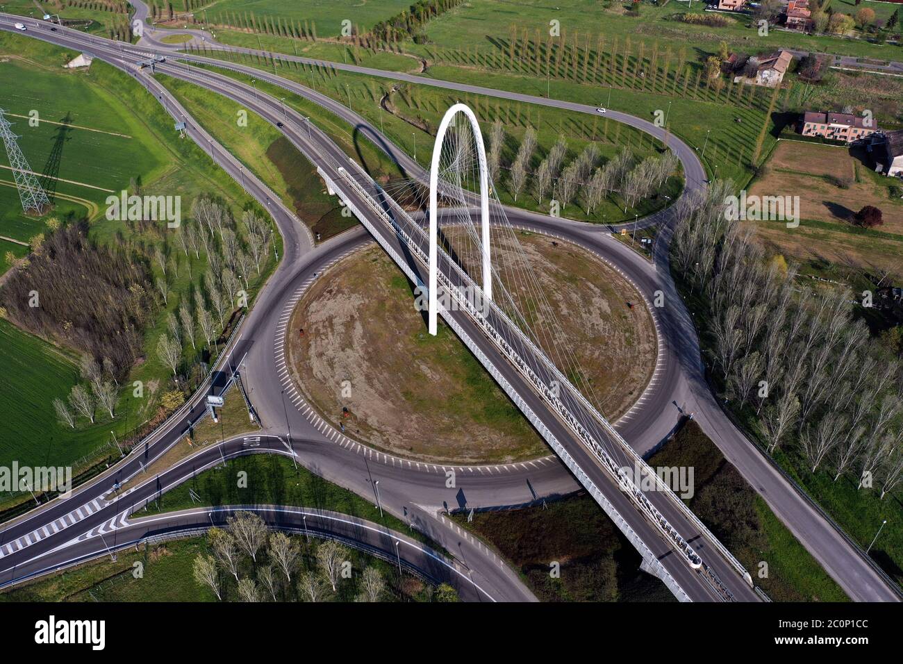 Reggio Emilia / Italy: aerial view of roundabout road with little car ...