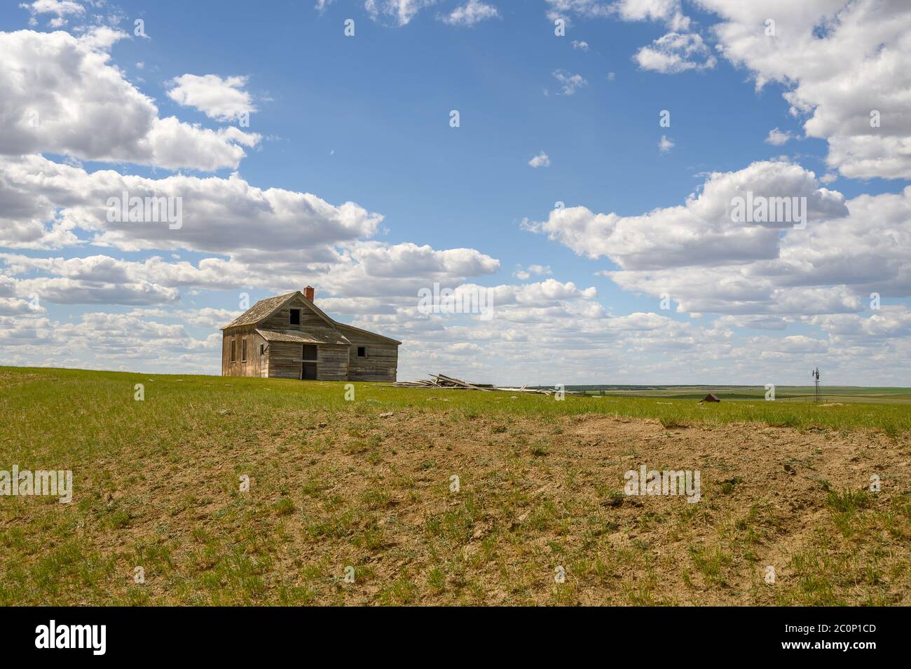 Abandoned farmhouse on the prairie of Saskatchewan near the town of ...