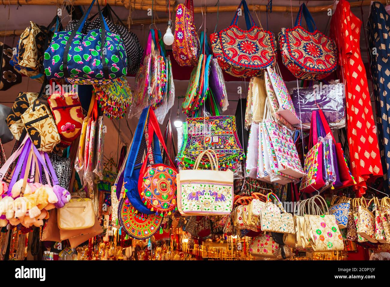 Small shop with indian colorful dresses in Delhi Stock Photo - Alamy