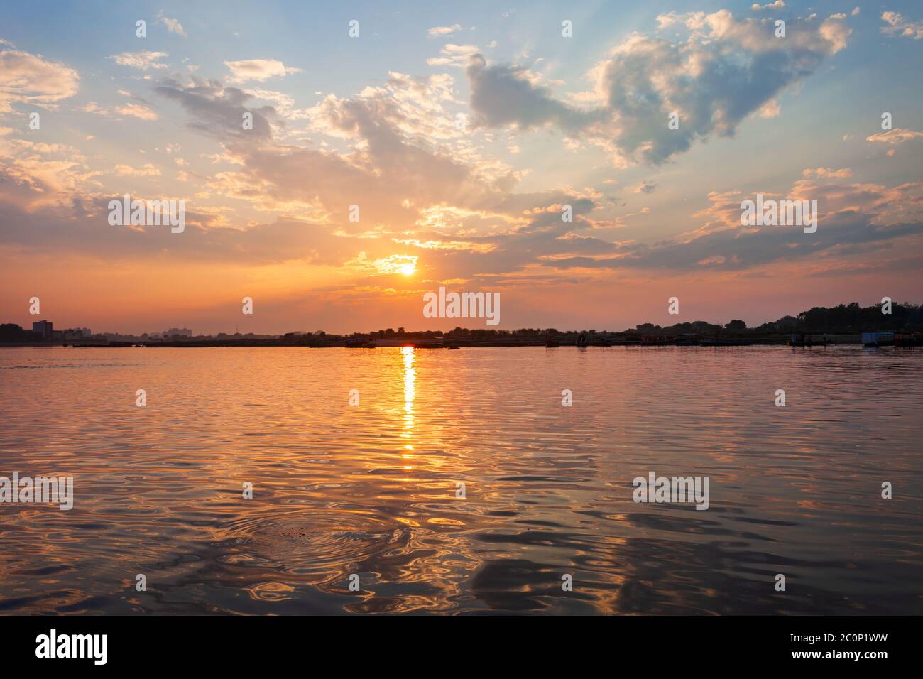 Sunset at the Keshi Ghat on Yamuna river in Vrindavan city in Uttar ...