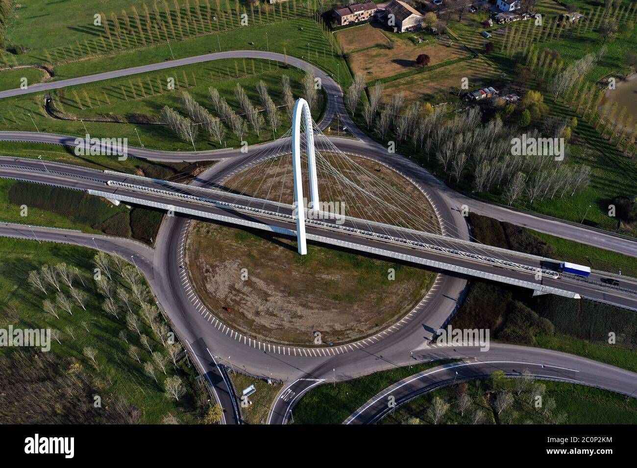 Reggio Emilia / Italy: aerial view of roundabout road with little car ...