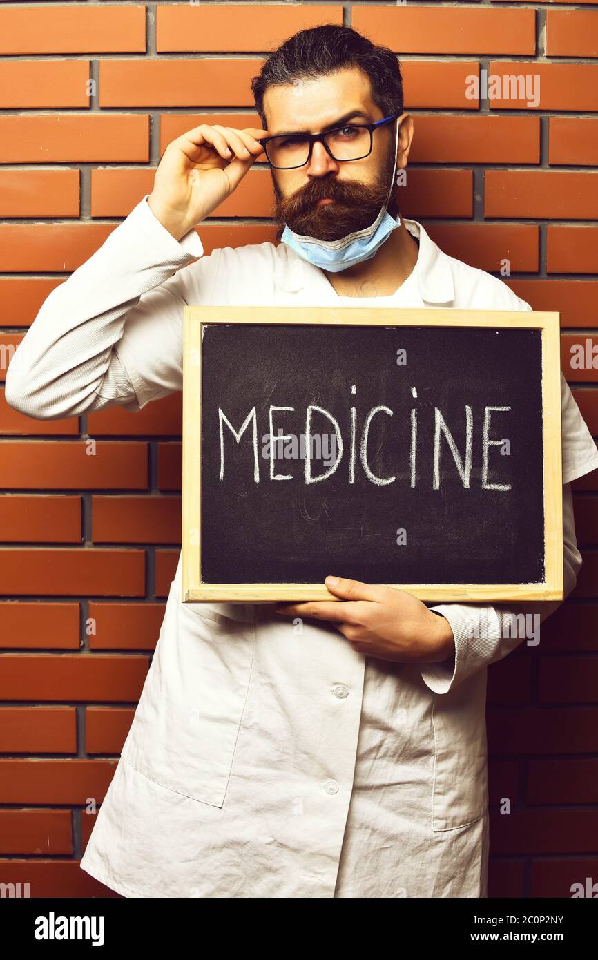 Bearded man, long beard. Brutal caucasian doctor or unshaven hipster ...